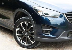 Blue Mazda CX-5 2015 in Kretinga, with an engine capacity of 2.19 L and mileage of 191 thousand km for 8599 €, photo 4 on AUTOMOTO.COM.LV