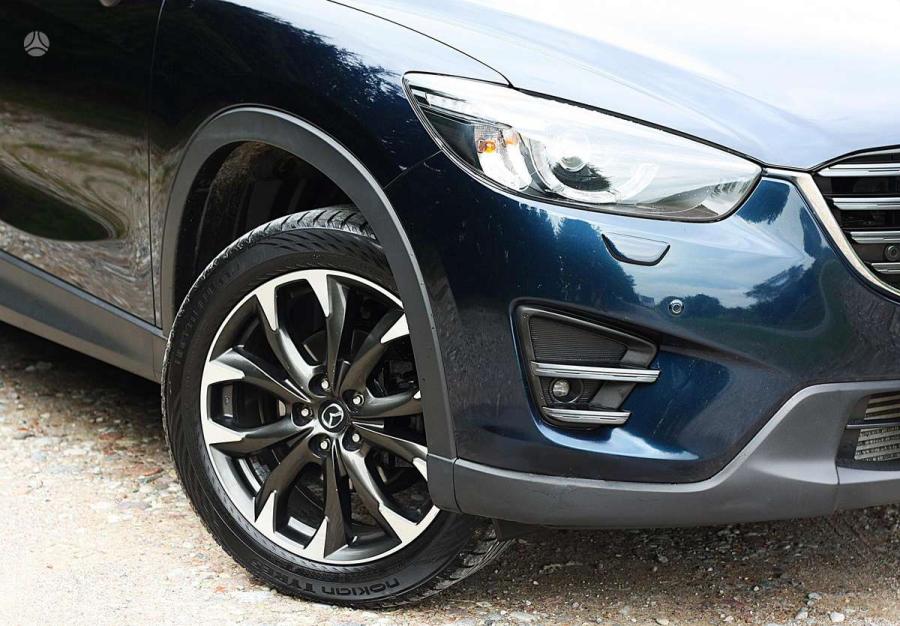 Blue Mazda CX-5 2015 in Kretinga, with an engine capacity of 2.19 L and mileage of 191 thousand km for 8599 €, photo 4 on AUTOMOTO.COM.LV