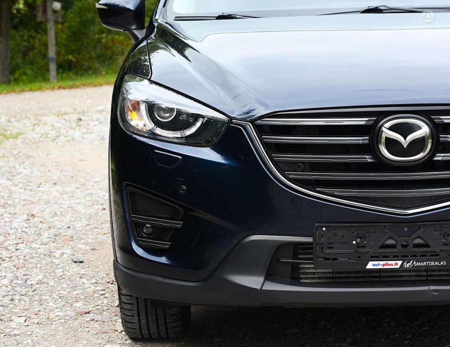 Blue Mazda CX-5 2015 in Kretinga, with an engine capacity of 2.19 L and mileage of 191 thousand km for 8599 €, photo 5 on AUTOMOTO.COM.LV