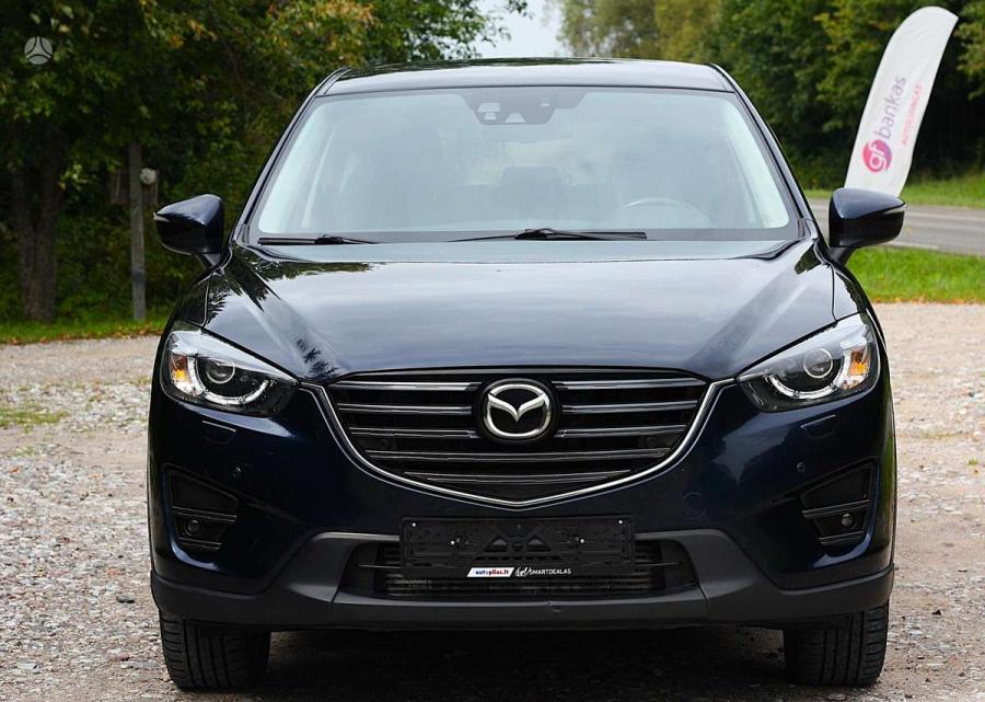Blue Mazda CX-5 2015 in Kretinga, with an engine capacity of 2.19 L and mileage of 191 thousand km for 8599 €, photo 6 on AUTOMOTO.COM.LV