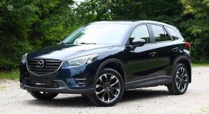 Blue Mazda CX-5 2015 in Kretinga, with an engine capacity of 2.19 L and mileage of 191 thousand km for 8599 €, photo 9 on AUTOMOTO.COM.LV