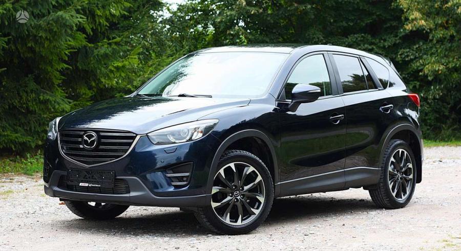Blue Mazda CX-5 2015 in Kretinga, with an engine capacity of 2.19 L and mileage of 191 thousand km for 8599 €, photo 9 on AUTOMOTO.COM.LV