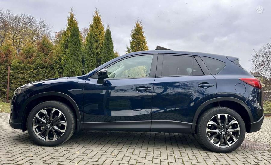 Blue Mazda CX-5 2016 in Kaunas, with an engine capacity of 2.19 L and mileage of 178 thousand km for 9490 €, photo 6 on AUTOMOTO.COM.LV