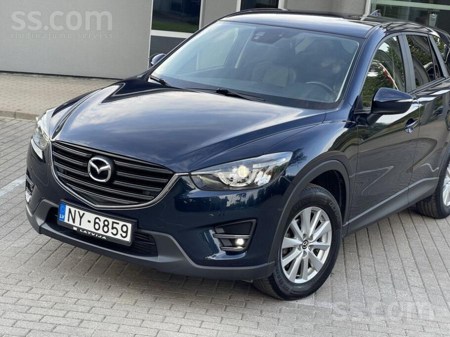 Blue Mazda CX-5 2016 in Jurmala, with an engine capacity of 2.20 L and mileage of 0 thousand km for 9250 €, photo 4 on AUTOMOTO.COM.LV