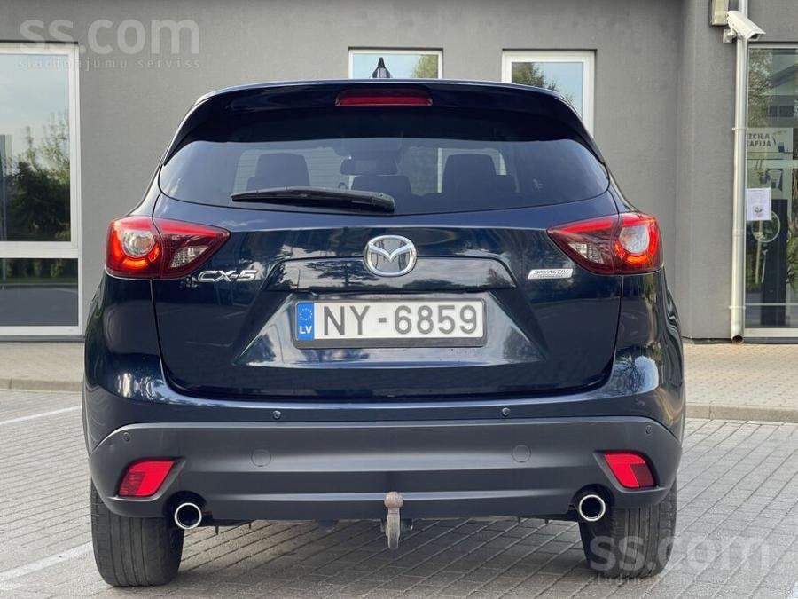 Blue Mazda CX-5 2016 in Jurmala, with an engine capacity of 2.20 L and mileage of 0 thousand km for 9250 €, photo 13 on AUTOMOTO.COM.LV