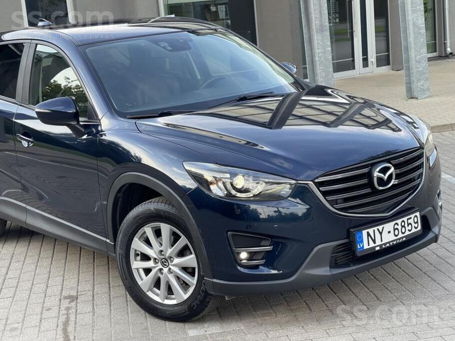 Blue Mazda CX-5 2016 in Jurmala, with an engine capacity of 2.20 L and mileage of 0 thousand km for 9250 €, photo 14 on AUTOMOTO.COM.LV