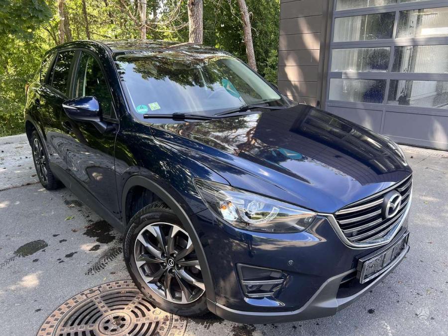 Blue Mazda CX-5 2016 in Utena, with an engine capacity of 2.19 L and mileage of 170 thousand km for 6500 €, photo 9 on AUTOMOTO.COM.LV