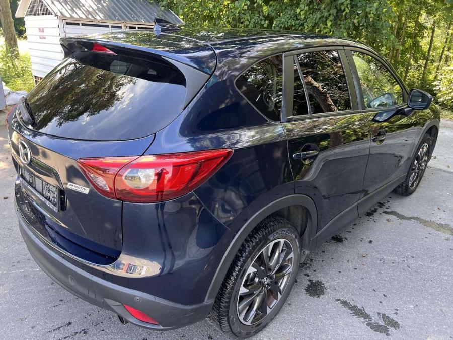 Blue Mazda CX-5 2016 in Utena, with an engine capacity of 2.19 L and mileage of 170 thousand km for 6500 €, photo 12 on AUTOMOTO.COM.LV