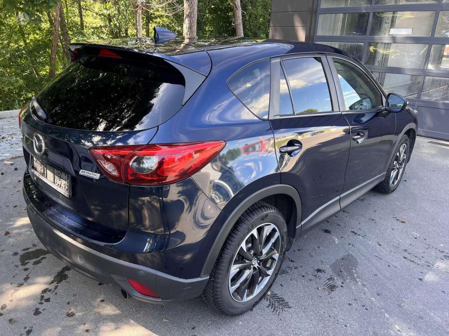 Blue Mazda CX-5 2016 in Utena, with an engine capacity of 2.19 L and mileage of 170 thousand km for 6500 €, photo 13 on AUTOMOTO.COM.LV