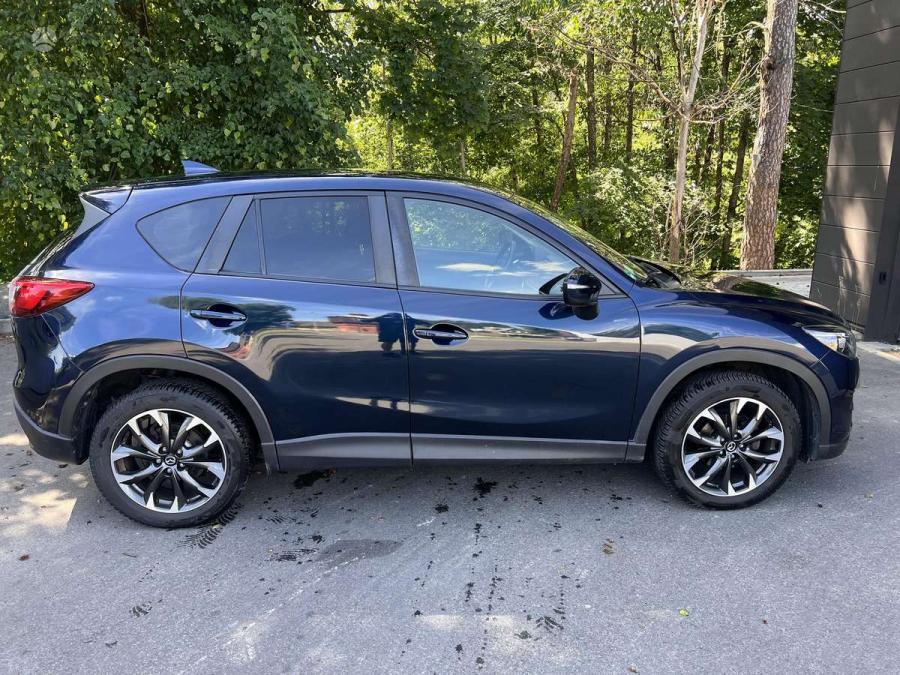 Blue Mazda CX-5 2016 in Utena, with an engine capacity of 2.19 L and mileage of 170 thousand km for 6500 €, photo 14 on AUTOMOTO.COM.LV