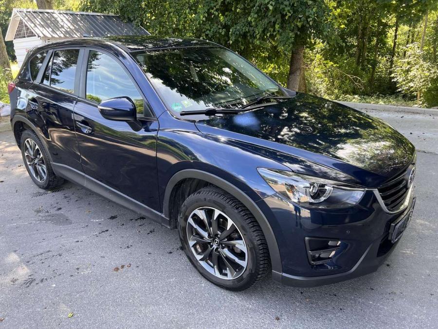 Blue Mazda CX-5 2016 in Utena, with an engine capacity of 2.19 L and mileage of 170 thousand km for 6500 €, photo 15 on AUTOMOTO.COM.LV
