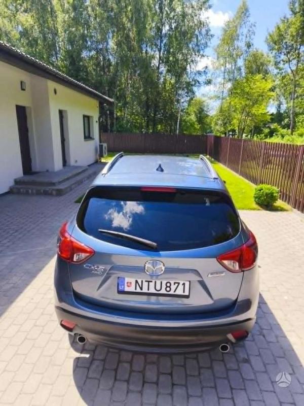 Blue Mazda CX-5 2016 in Vilnius, with an engine capacity of 2.49 L and mileage of 181 thousand km for 11300 €, photo 7 on AUTOMOTO.COM.LV