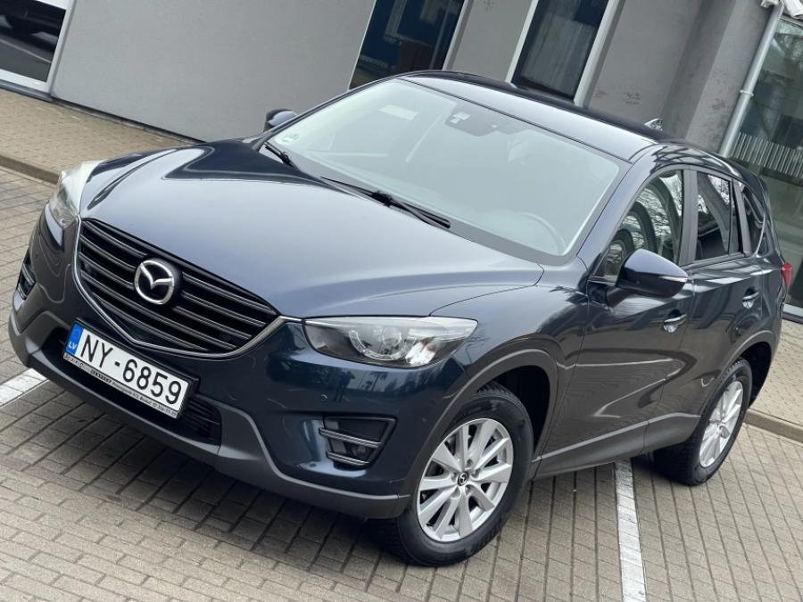 Blue Mazda CX-5 2016 in Riga, with an engine capacity of 2.20 L and mileage of 215 thousand km for 12450 €, photo 1 on AUTOMOTO.COM.LV