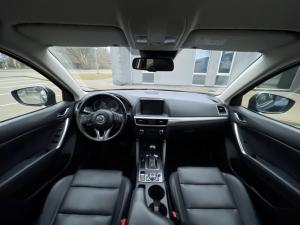 Blue Mazda CX-5 2016 in Riga, with an engine capacity of 2.20 L and mileage of 215 thousand km for 12450 €, photo 5 on AUTOMOTO.COM.LV