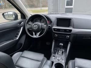 Blue Mazda CX-5 2016 in Riga, with an engine capacity of 2.20 L and mileage of 215 thousand km for 12450 €, photo 6 on AUTOMOTO.COM.LV