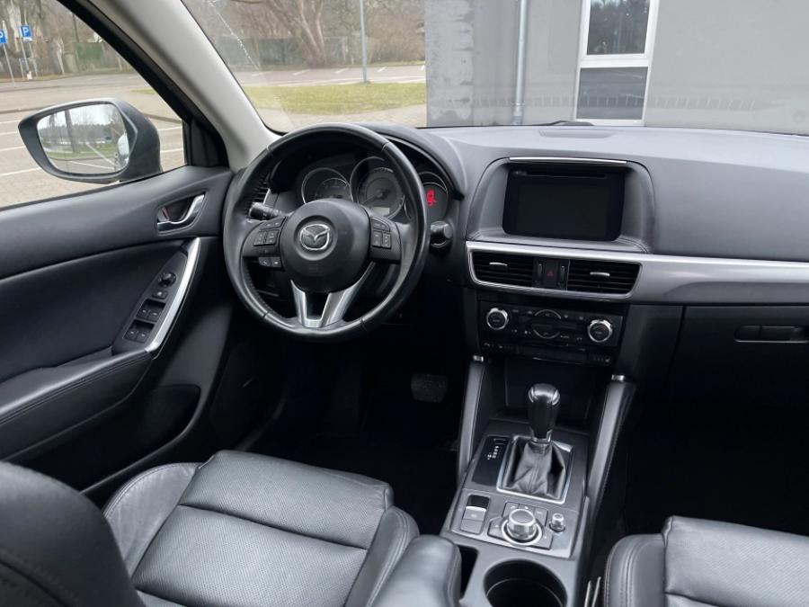 Blue Mazda CX-5 2016 in Riga, with an engine capacity of 2.20 L and mileage of 215 thousand km for 12450 €, photo 6 on AUTOMOTO.COM.LV