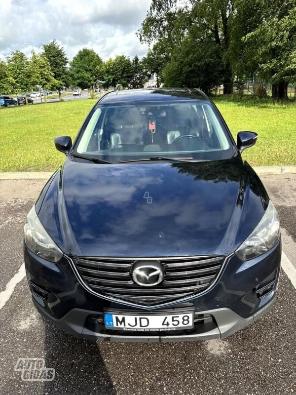 Blue Mazda CX-5 2016 in Klaipeda, with an engine capacity of 2.20 L and mileage of 260 thousand km for 8000 €, photo 4 on AUTOMOTO.COM.LV