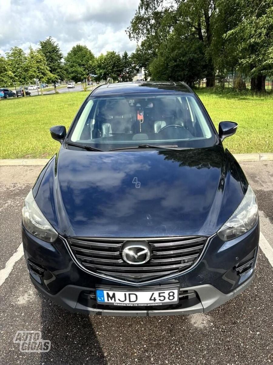 Blue Mazda CX-5 2016 in Klaipeda, with an engine capacity of 2.20 L and mileage of 260 thousand km for 8000 €, photo 5 on AUTOMOTO.COM.LV