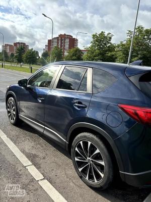 Blue Mazda CX-5 2016 in Klaipeda, with an engine capacity of 2.20 L and mileage of 260 thousand km for 8000 €, photo 6 on AUTOMOTO.COM.LV