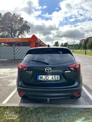 Blue Mazda CX-5 2016 in Klaipeda, with an engine capacity of 2.20 L and mileage of 260 thousand km for 8000 €, photo 7 on AUTOMOTO.COM.LV