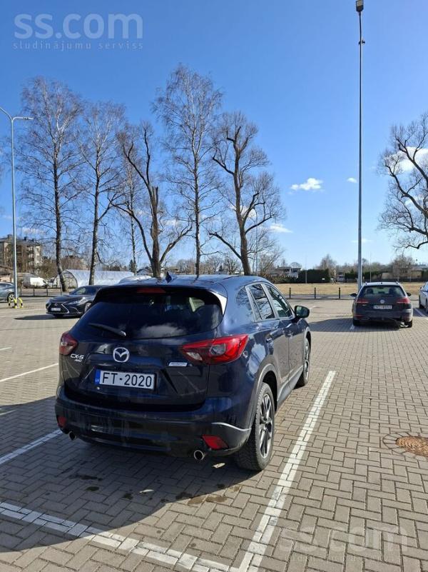 Mazda CX-5 2016 in Riga on AUTOMOTO.COM.LV Blue Mazda CX-5 2016 in Riga, with an engine capacity of 2.20 L and mileage of 209 thousand km for 8300 ā¬, photo 3 on AUTOMOTO.COM.LV