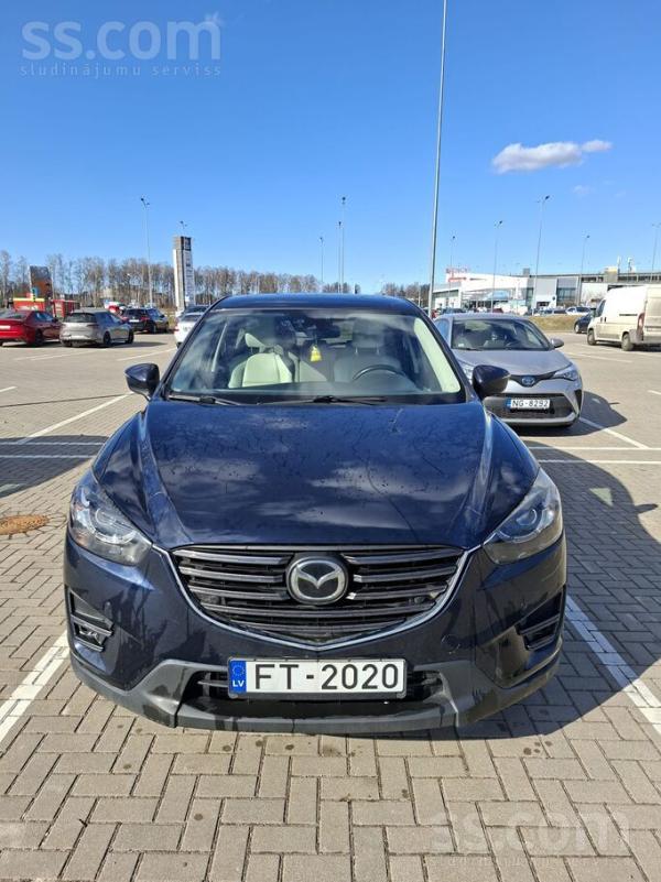 Mazda CX-5 2016 in Riga on AUTOMOTO.COM.LV Blue Mazda CX-5 2016 in Riga, with an engine capacity of 2.20 L and mileage of 209 thousand km for 8300 ā¬, photo 4 on AUTOMOTO.COM.LV
