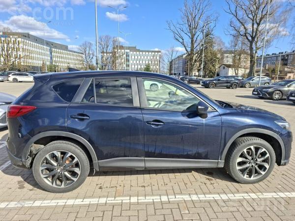 Mazda CX-5 2016 in Riga on AUTOMOTO.COM.LV Blue Mazda CX-5 2016 in Riga, with an engine capacity of 2.20 L and mileage of 209 thousand km for 8300 ā¬, photo 5 on AUTOMOTO.COM.LV