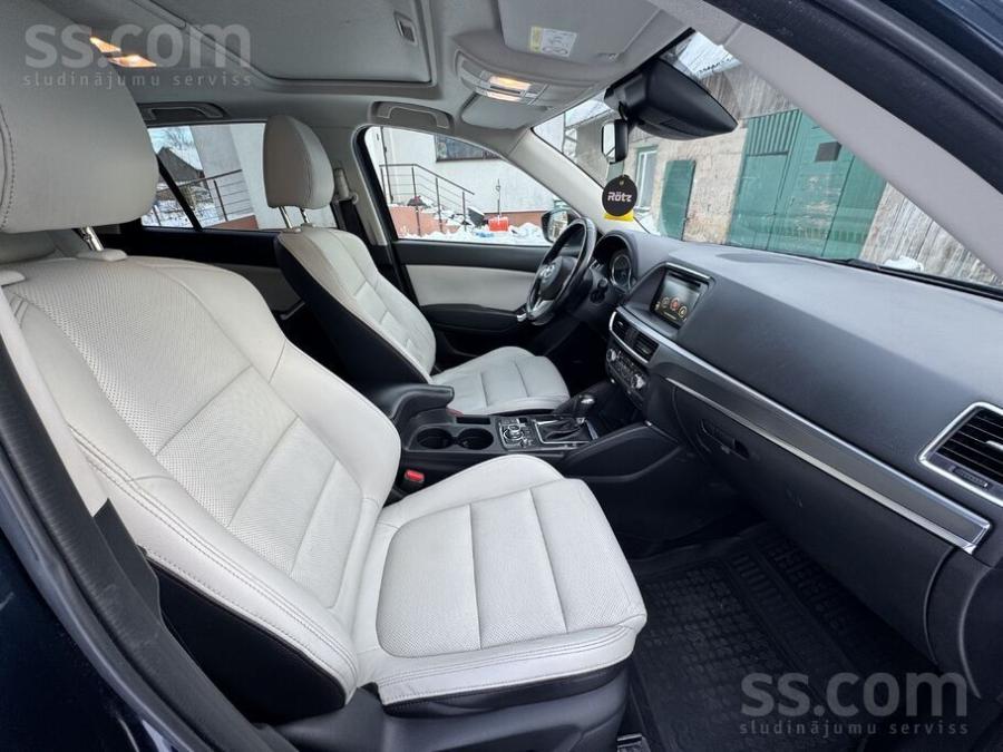 Zils Mazda CX-5 2016 Rīga, ar dzinēja tilpumu 2.20 L un nobraukumu 209 tūkst. km par 8300 €, foto 9 vietnē AUTOMOTO.COM.LV