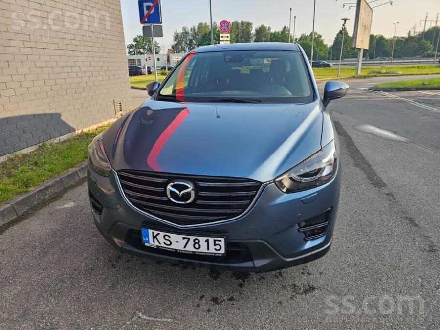 Zils Mazda CX-5 2017 Rīga, ar dzinēja tilpumu 2.00 L un nobraukumu 54 tūkst. km par 19800 €, foto 2 vietnē AUTOMOTO.COM.LV