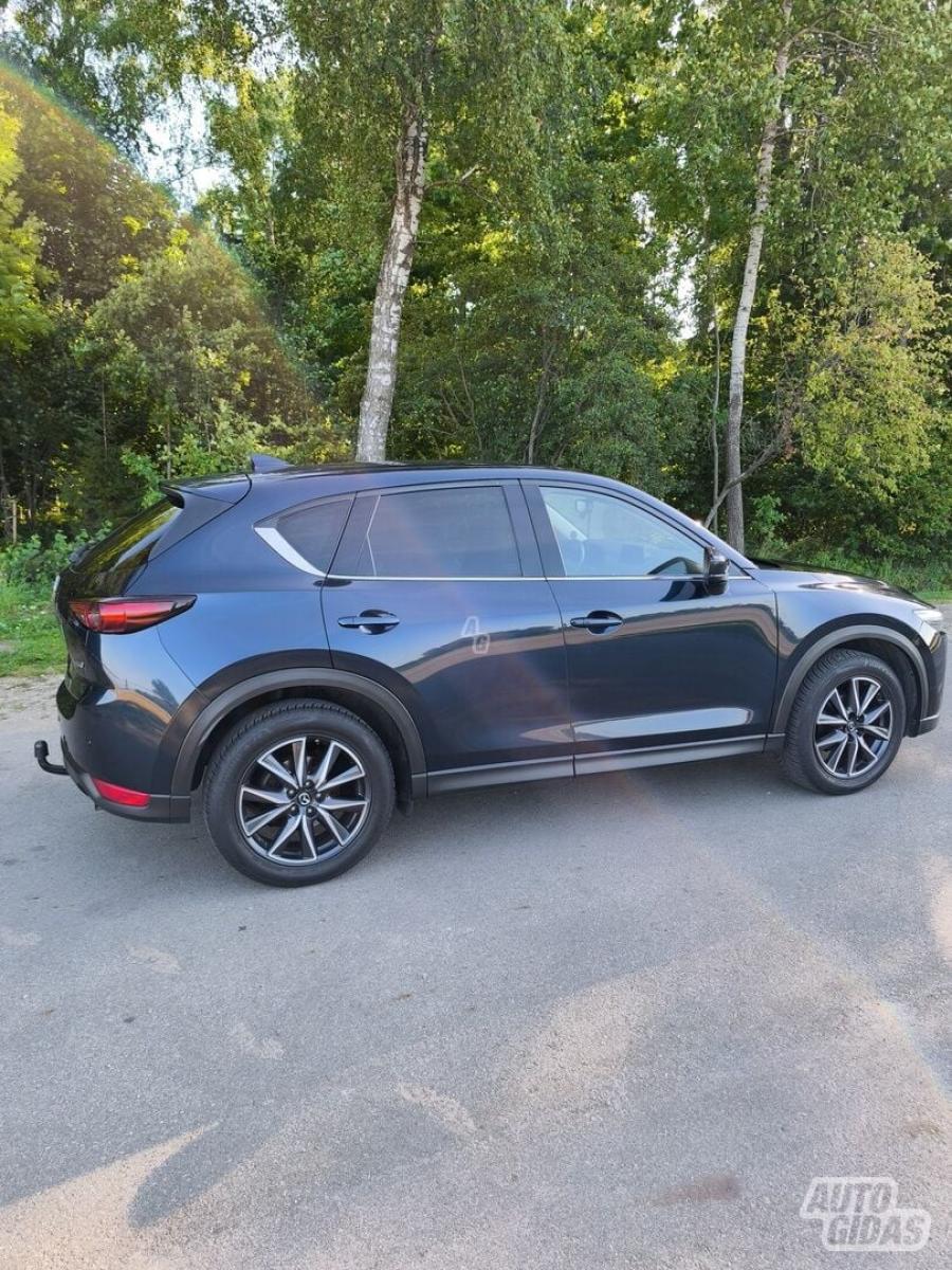 Blue Mazda CX-5 2017 in Siauliai, with an engine capacity of 2.20 L and mileage of 200 thousand km for 11500 €, photo 5 on AUTOMOTO.COM.LV
