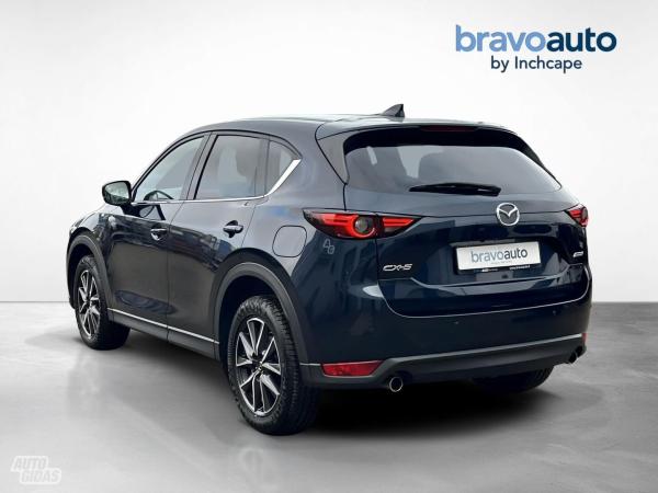 Mazda CX-5 2018 in Kaunas on AUTOMOTO.COM.LV Blue Mazda CX-5 2018 in Kaunas, with an engine capacity of 2.50 L and mileage of 128 thousand km for 19772 €, photo 4 on AUTOMOTO.COM.LV