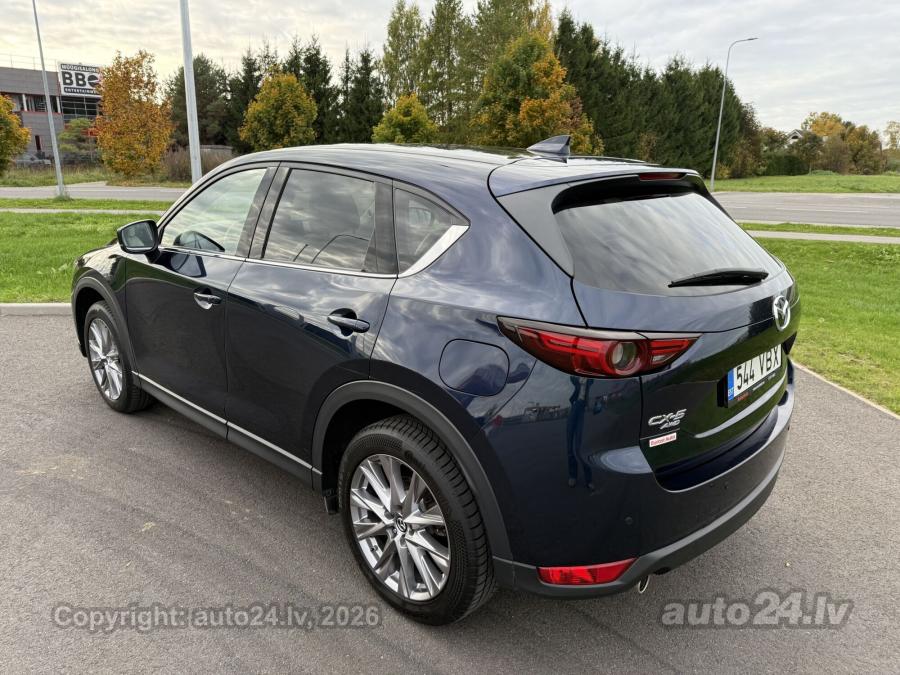 Blue Mazda CX-5 2020 in Tallinn, with an engine capacity of 2.50 L and mileage of 92 thousand km for 21900 €, photo 3 on AUTOMOTO.COM.LV