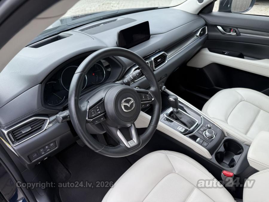 Blue Mazda CX-5 2020 in Tallinn, with an engine capacity of 2.50 L and mileage of 92 thousand km for 21900 €, photo 6 on AUTOMOTO.COM.LV