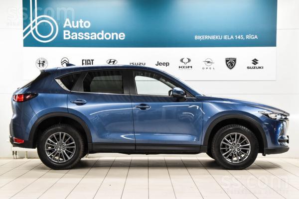 Blue Mazda CX-5 2021 in Riga, with an engine capacity of 2.00 L and mileage of 31 thousand km for 20990 €, photo 4 on AUTOMOTO.COM.LV