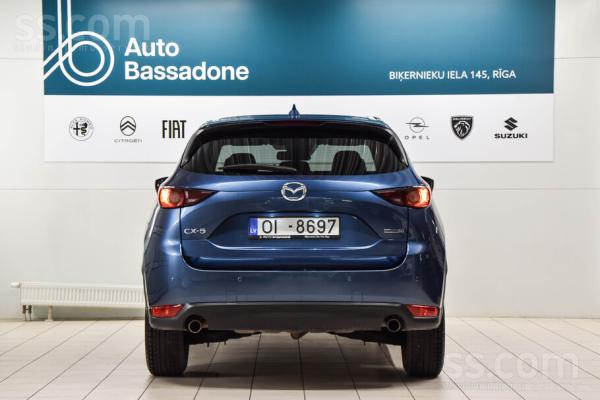 Blue Mazda CX-5 2021 in Riga, with an engine capacity of 2.00 L and mileage of 31 thousand km for 20990 €, photo 6 on AUTOMOTO.COM.LV