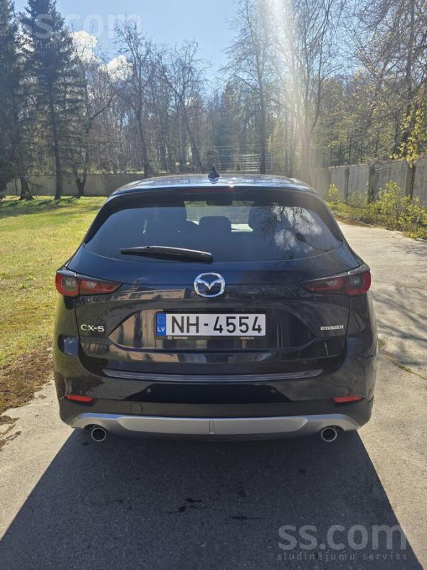 Blue Mazda CX-5 2022 in Riga, with an engine capacity of 2.00 L and mileage of 43 thousand km for 24800 €, photo 2 on AUTOMOTO.COM.LV