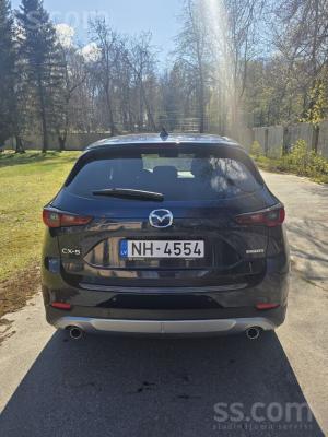 Blue Mazda CX-5 2022 in Riga, with an engine capacity of 2.00 L and mileage of 43 thousand km for 24800 €, photo 3 on AUTOMOTO.COM.LV