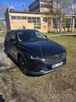 Blue Mazda CX-5 2022 in Riga, with an engine capacity of 2.00 L and mileage of 43 thousand km for 27100 €, photo 4 on AUTOMOTO.COM.LV