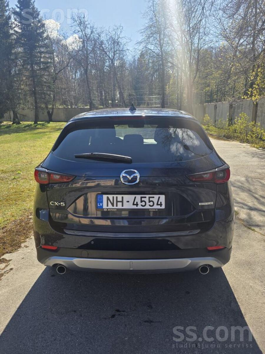 Blue Mazda CX-5 2022 in Riga, with an engine capacity of 2.00 L and mileage of 43 thousand km for 27100 €, photo 6 on AUTOMOTO.COM.LV