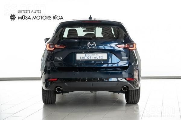 Blue Mazda CX-5 2023 in Riga, with an engine capacity of 2.50 L and mileage of 29 thousand km for 30900 €, photo 4 on AUTOMOTO.COM.LV