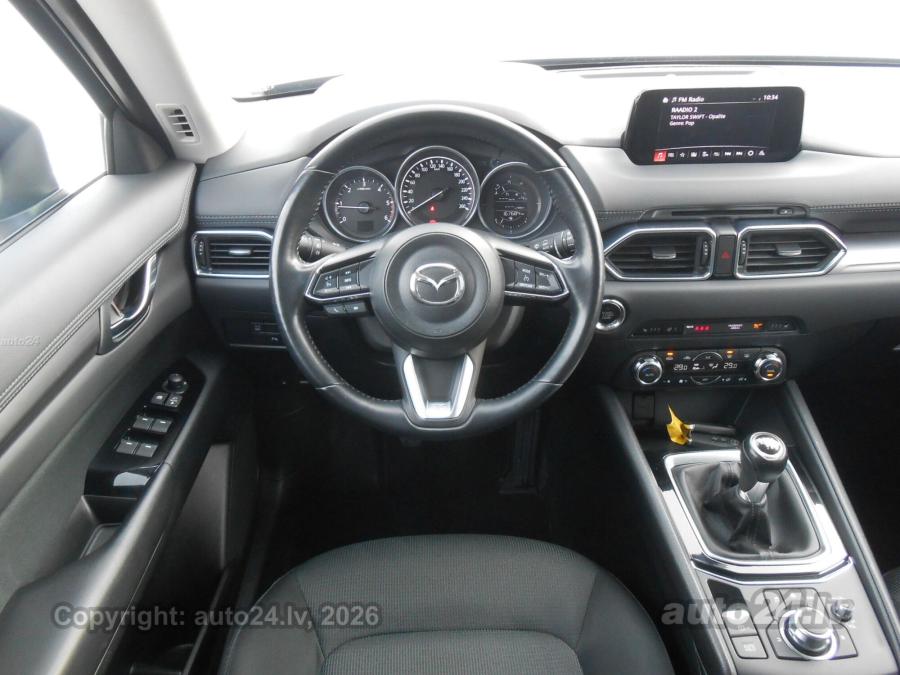 Blue Mazda CX-5 2017 in Viljandi, with an engine capacity of 2.20 L and mileage of 168 thousand km for 12890 €, photo 6 on AUTOMOTO.COM.LV