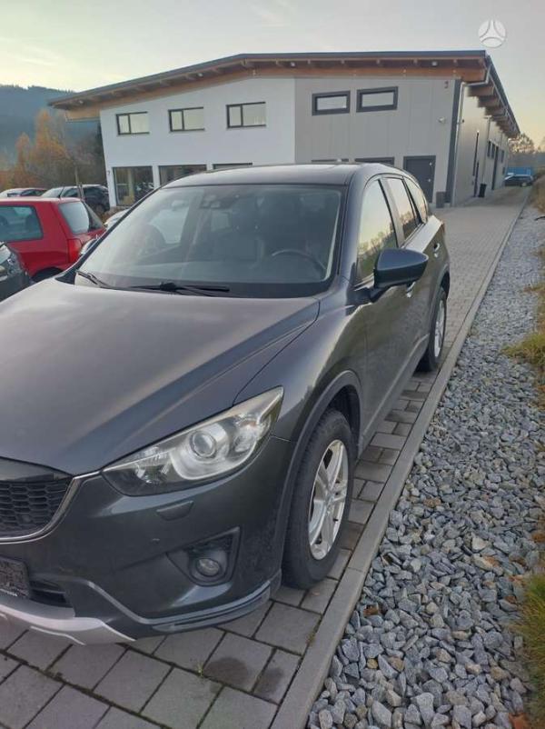 Brown Mazda CX-5 2013 in Rokiskis, with an engine capacity of 2.19 L and mileage of 224 thousand km for 7650 €, photo 3 on AUTOMOTO.COM.LV