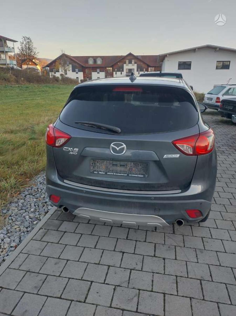 Brown Mazda CX-5 2013 in Rokiskis, with an engine capacity of 2.19 L and mileage of 224 thousand km for 7650 €, photo 5 on AUTOMOTO.COM.LV