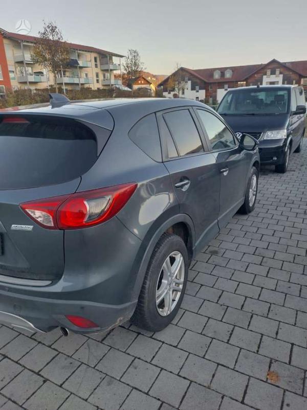 Brown Mazda CX-5 2013 in Rokiskis, with an engine capacity of 2.19 L and mileage of 224 thousand km for 7650 €, photo 6 on AUTOMOTO.COM.LV