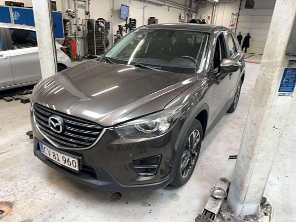 Brown Mazda CX-5 2015 in Taurage, with an engine capacity of 2.20 L and mileage of 250 thousand km for 4800 €, photo 1 on AUTOMOTO.COM.LV