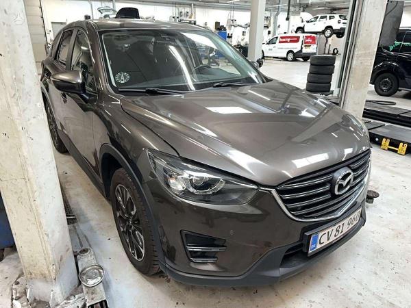Brown Mazda CX-5 2015 in Taurage, with an engine capacity of 2.20 L and mileage of 250 thousand km for 4800 €, photo 2 on AUTOMOTO.COM.LV