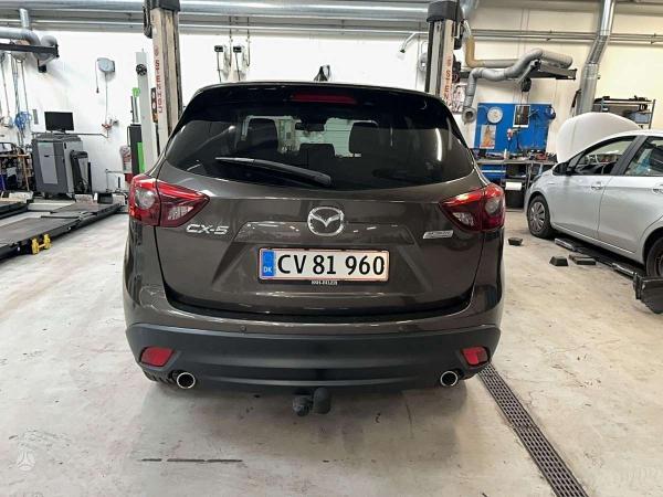 Brown Mazda CX-5 2015 in Taurage, with an engine capacity of 2.20 L and mileage of 250 thousand km for 4800 €, photo 4 on AUTOMOTO.COM.LV