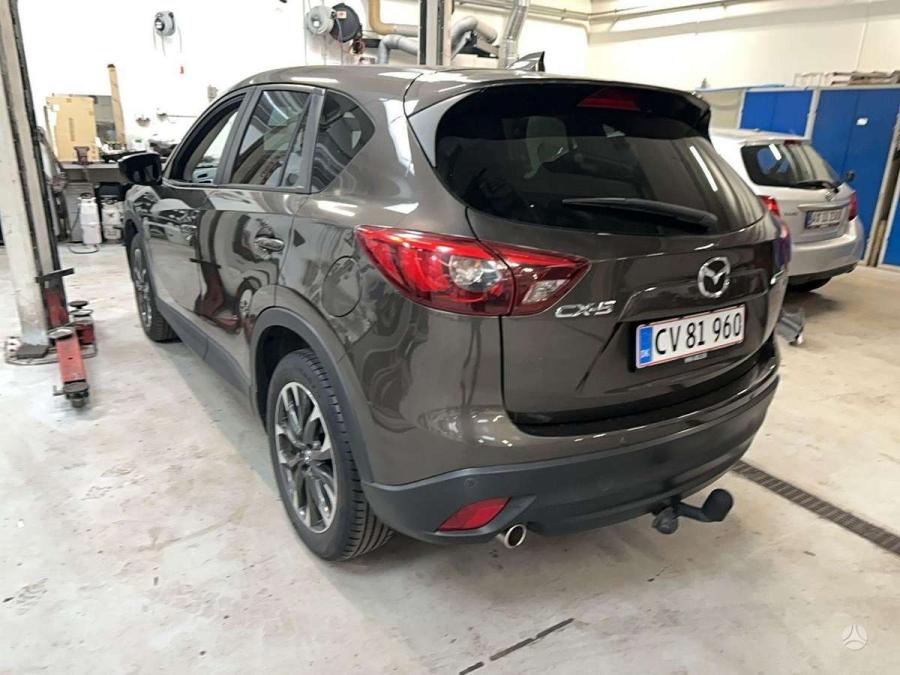 Brūns Mazda CX-5 2015 Tauragė, ar dzinēja tilpumu 2.20 L un nobraukumu 250 tūkst. km par 4800 €, foto 5 vietnē AUTOMOTO.COM.LV