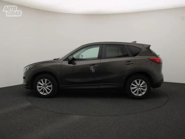 Brown Mazda CX-5 2015 in Vilnius, with an engine capacity of 2.00 L and mileage of 172 thousand km for 12699 €, photo 6 on AUTOMOTO.COM.LV
