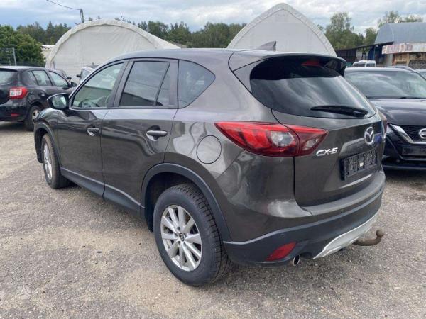 Brown Mazda CX-5 2016 in Radviliskis, with an engine capacity of 2.19 L and mileage of 219 thousand km for 5950 €, photo 4 on AUTOMOTO.COM.LV